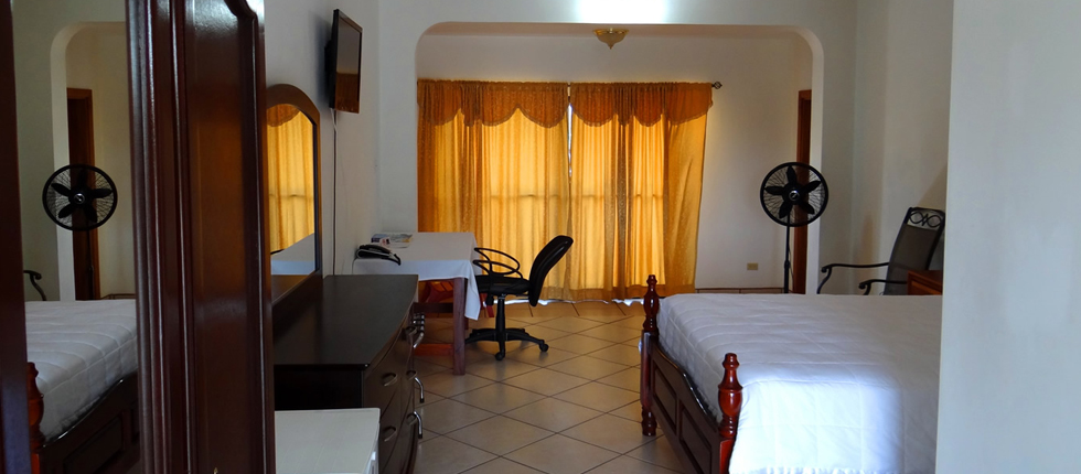 Rooms & Rates - Belmopan Hotel - Bullfrog Inn