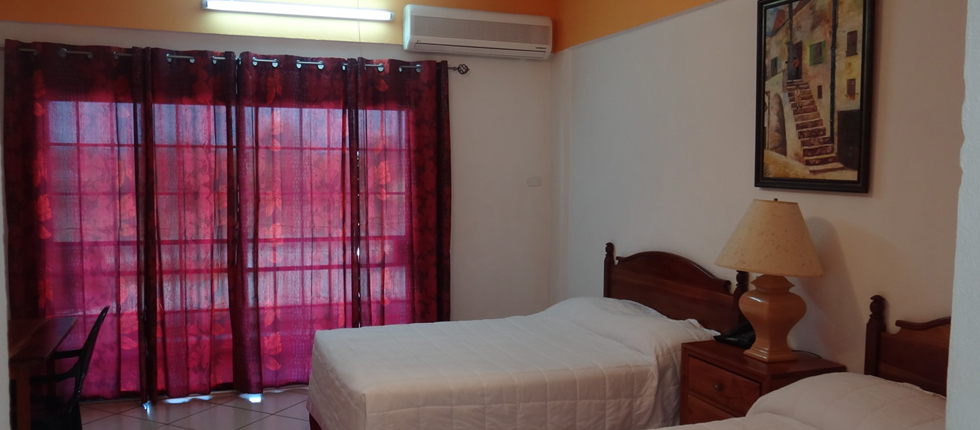 Rooms & Rates - Belmopan Hotel - Bullfrog Inn