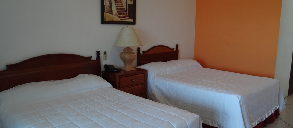 Rooms & Rates - Belmopan Hotel - Bullfrog Inn